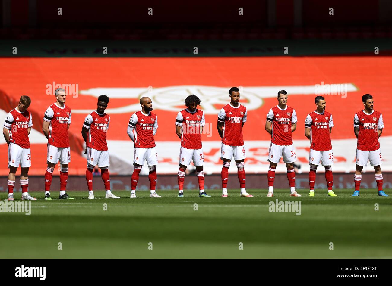 Arsenal players stand for a minute's silence in memory of the Duke of ...