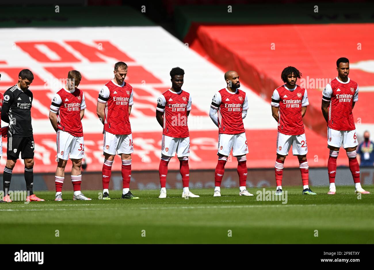 Arsenal players observe a minute's silence in memory of The Duke of ...
