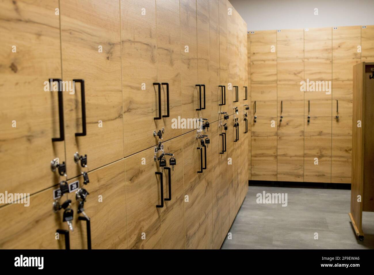 Wooden locker boxes, with metal locks. Classic wood locker room and a ...