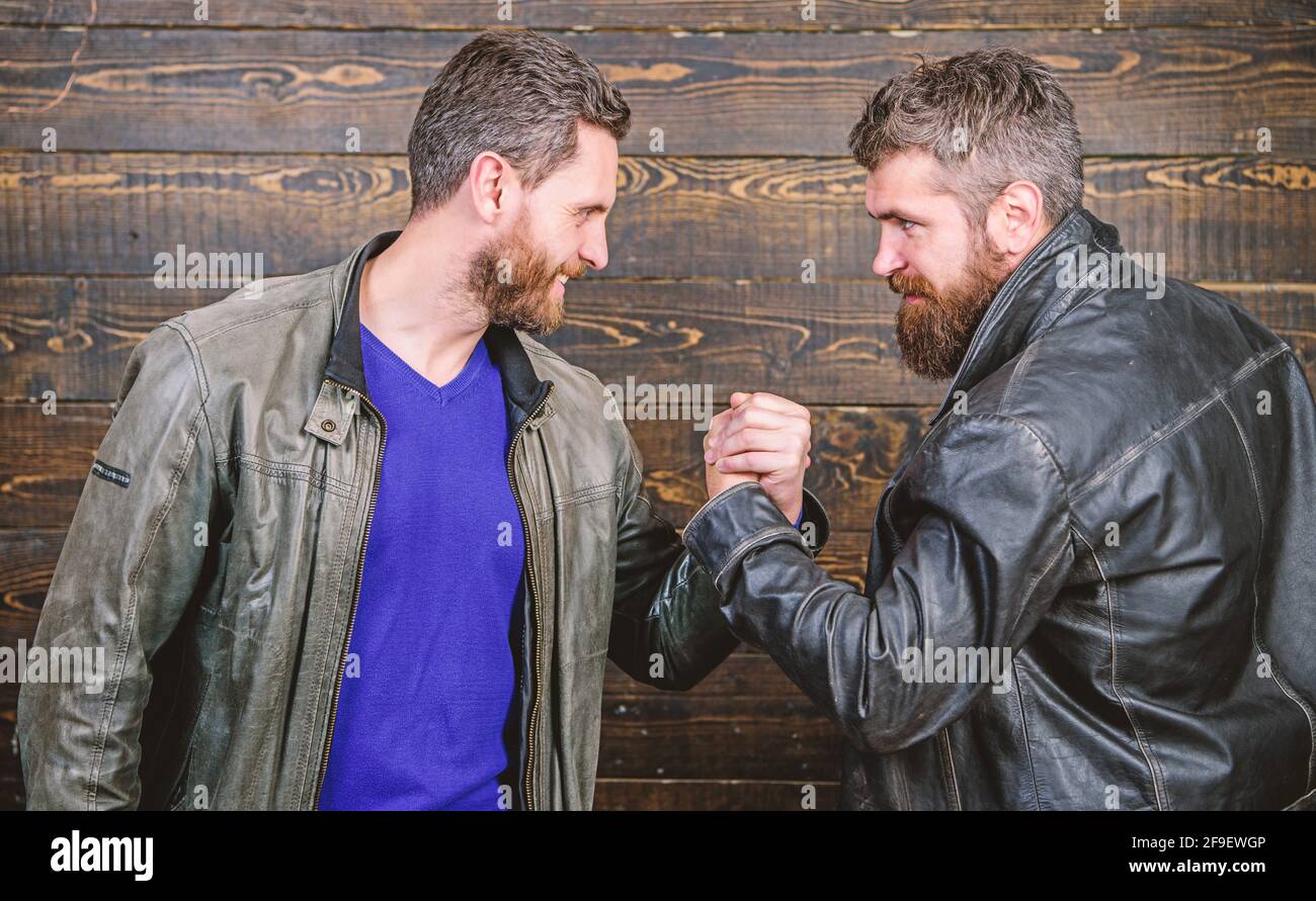 Strong handshake. Friendship of brutal guys. Handshake symbol of ...