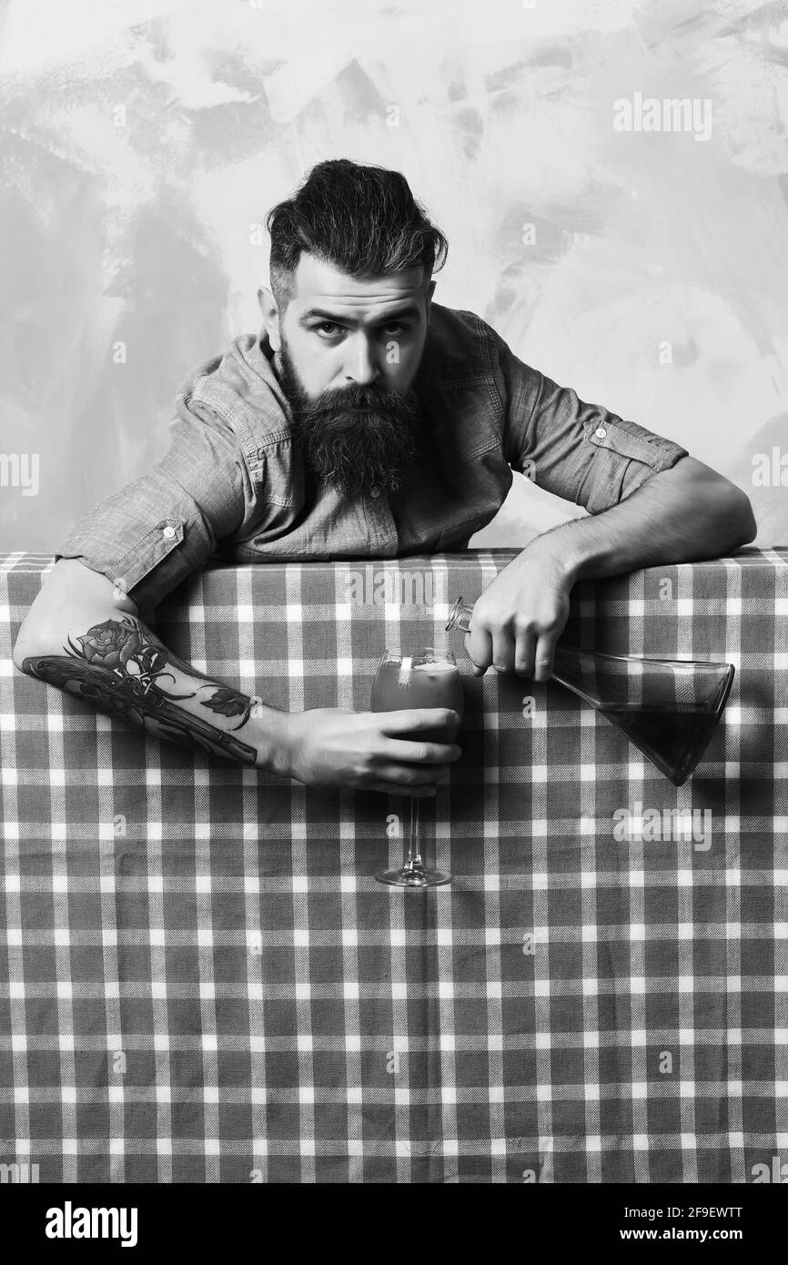 Brutal caucasian hipster with alcohol cocktail and flask Stock Photo ...
