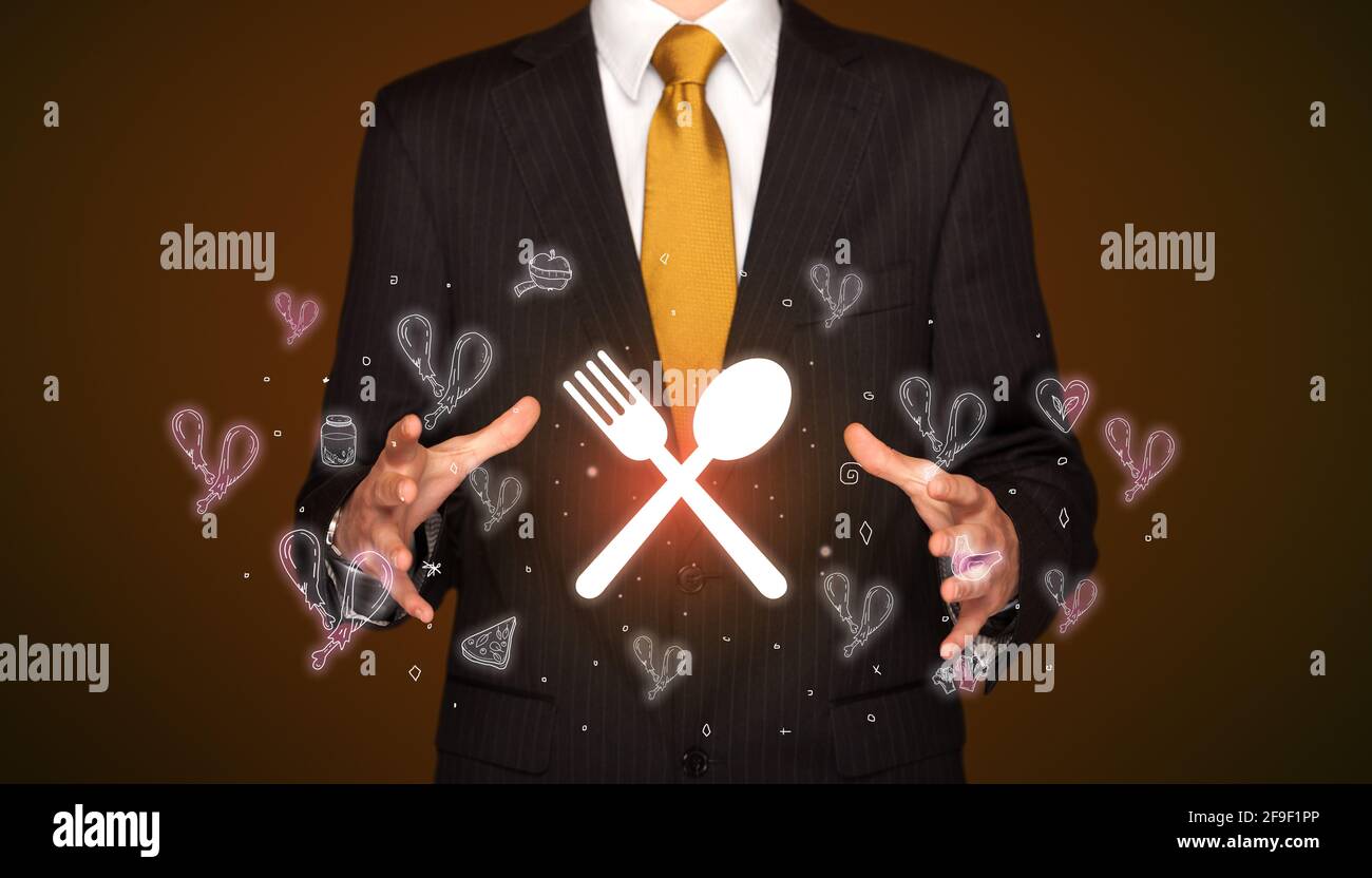 Hand holding food related icons Stock Photo - Alamy