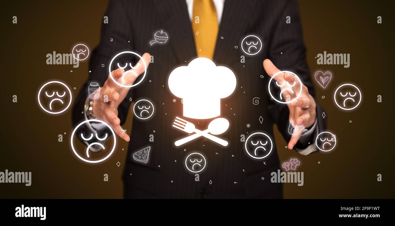 Hand holding food related icons Stock Photo - Alamy