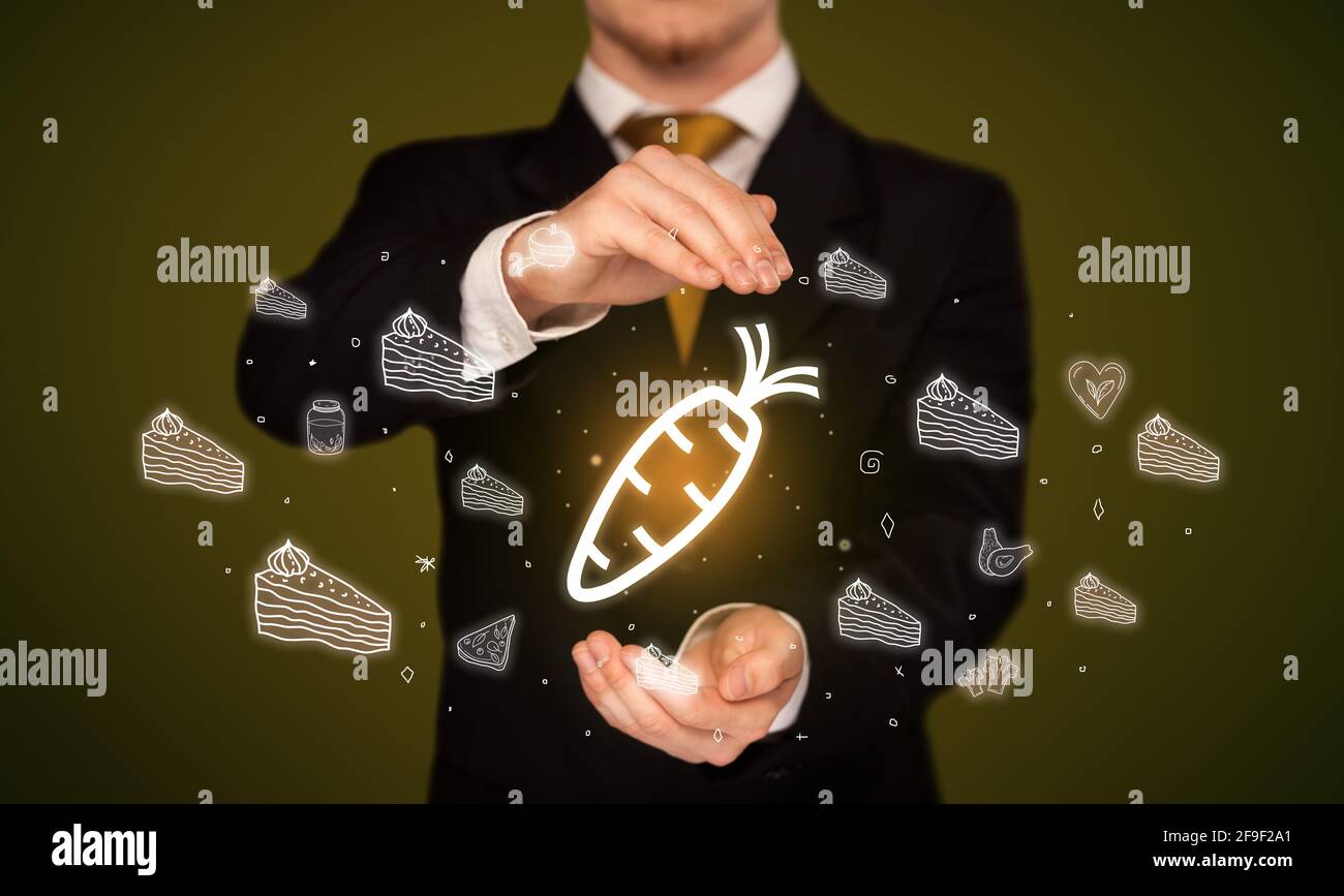 Hand holding food related icons Stock Photo - Alamy