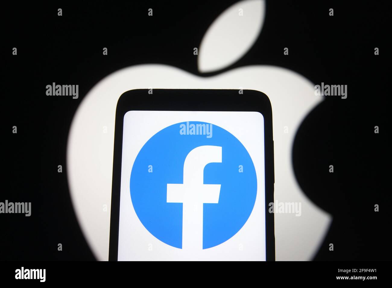 In this photo illustration, the Facebook logo seen displayed on a ...