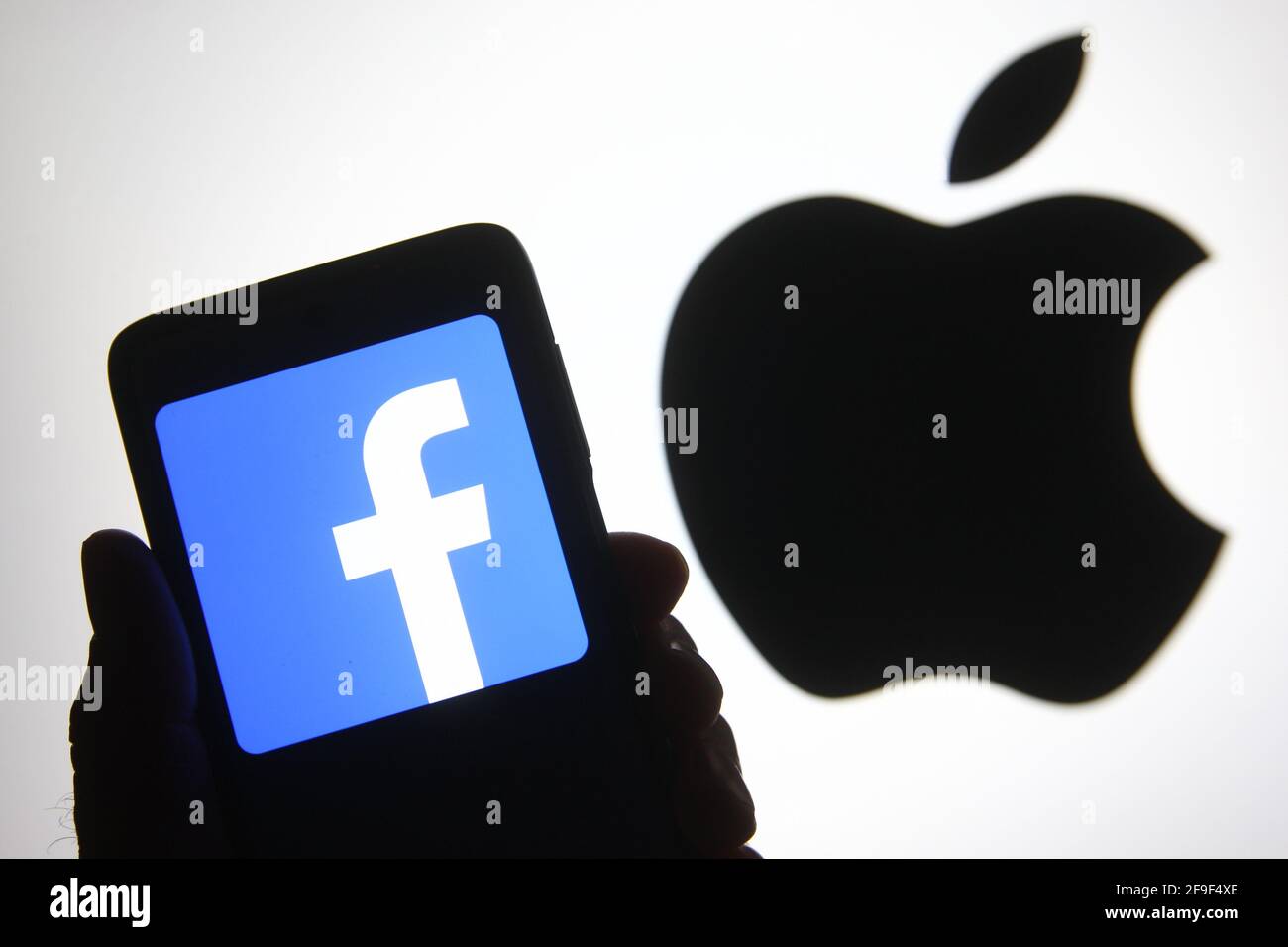 In this photo illustration, the Facebook logo seen displayed on a ...