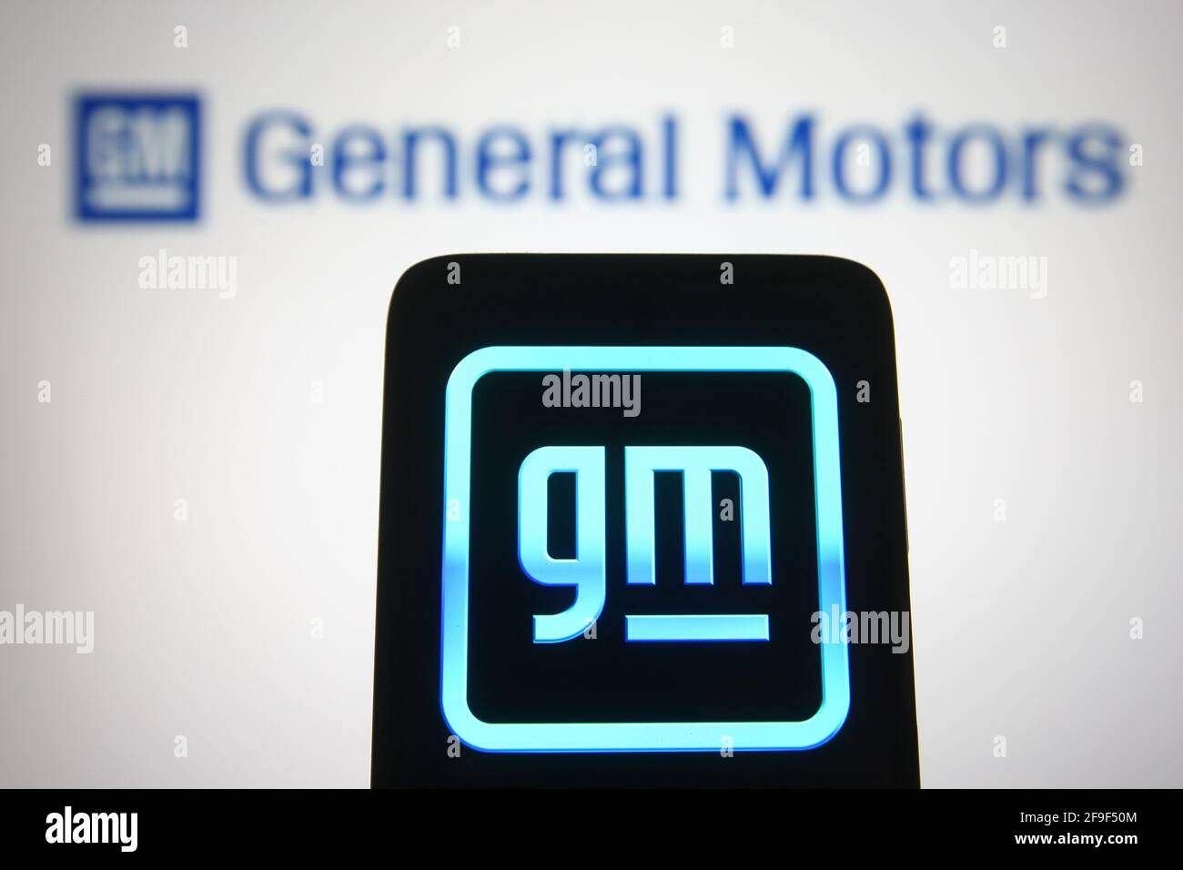 In this photo illustration, the General Motors (GM) logo seen displayed ...