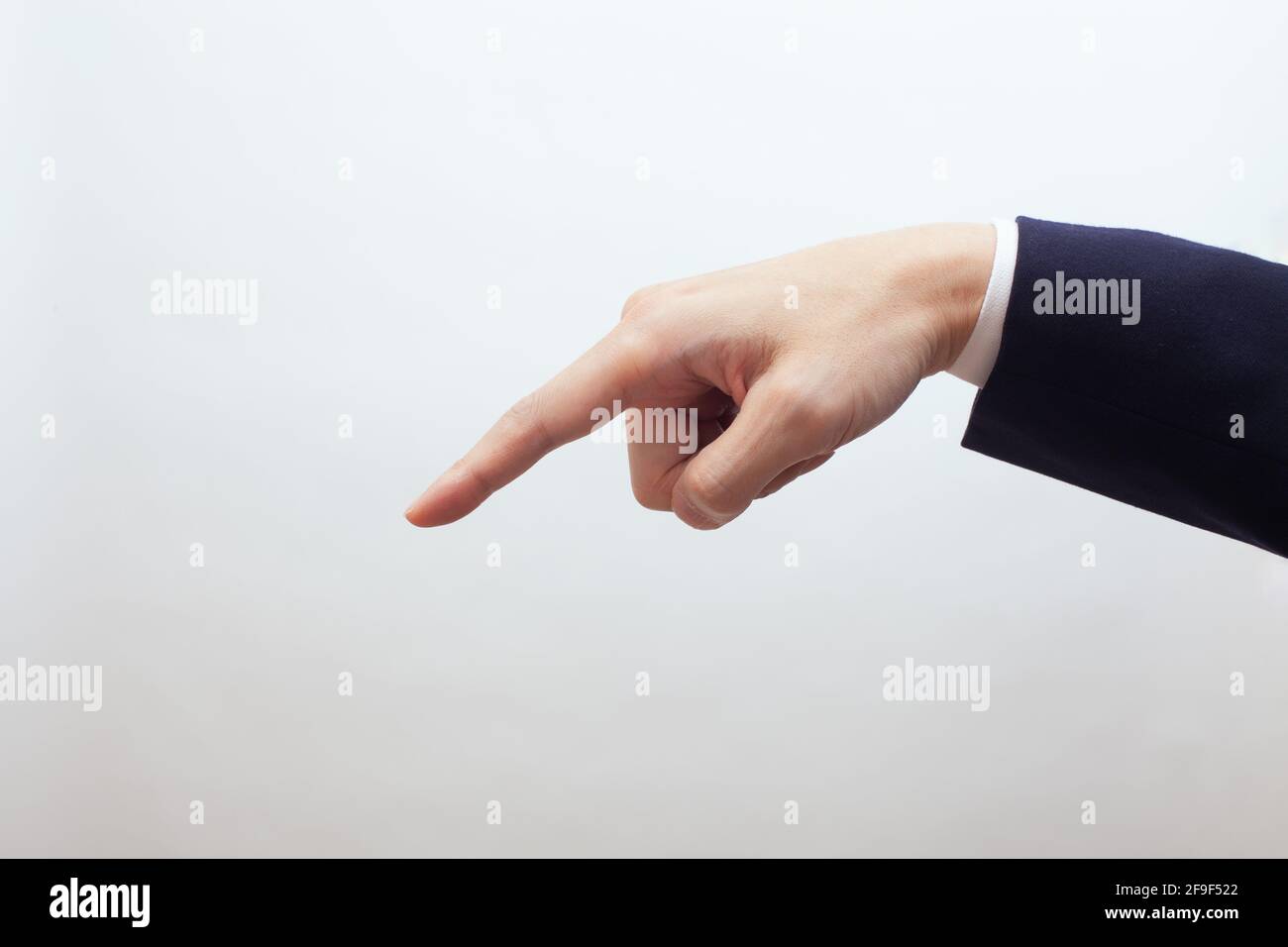 A businessman's hand pushing a button with his index finger Stock Photo ...