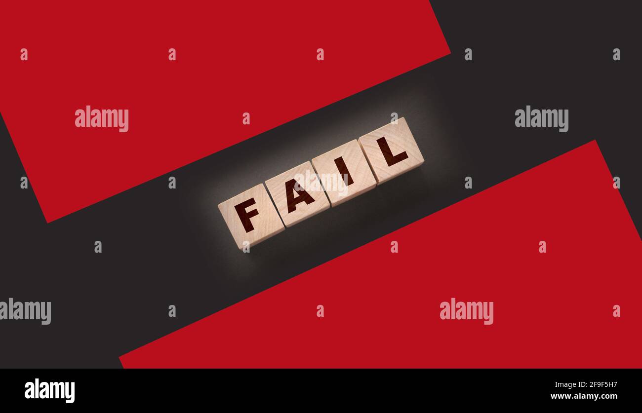 FAIL Word text Written In Wooden Cube blocks on black background ...