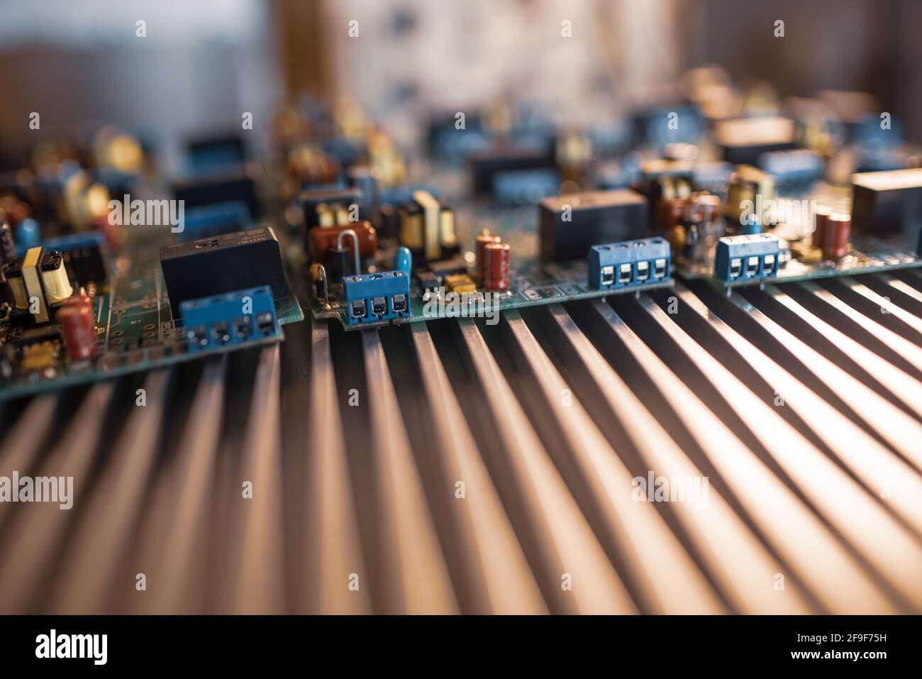 Microcircuits and components lie on metal plates Stock Photo - Alamy