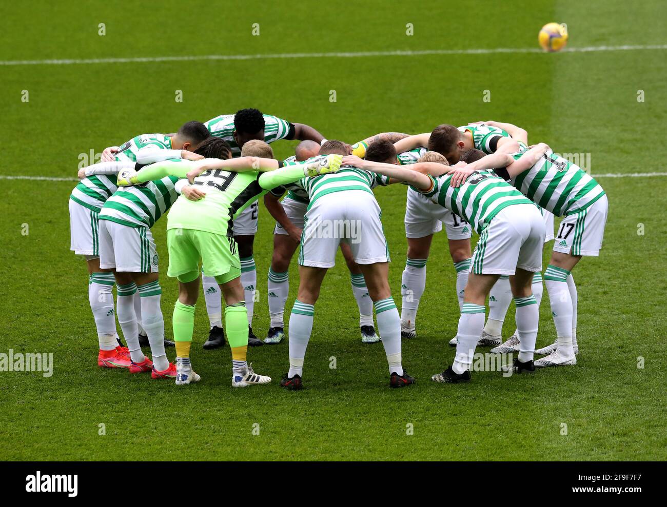 Celtic players huddle together on the pitch ahead of the Scottish Cup ...