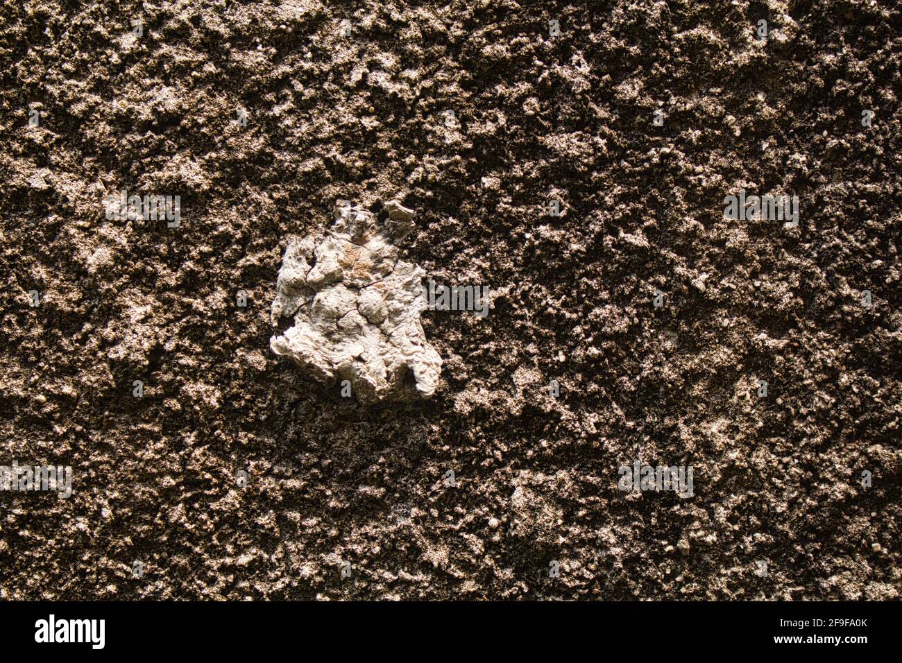 Smears on the rough stone wall background Stock Photo - Alamy