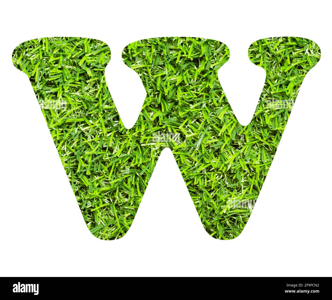 Letter W - Artificial green grass background Stock Photo - Alamy