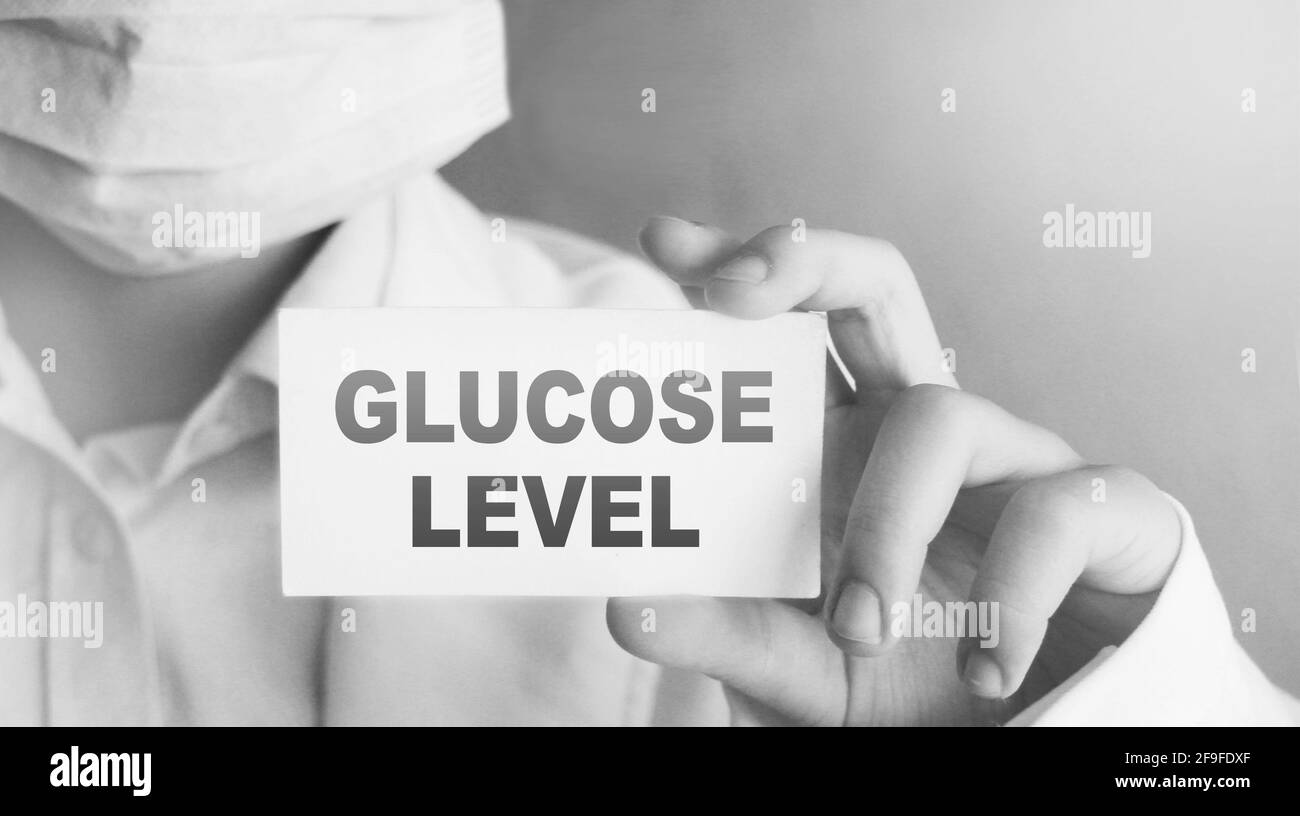 Glucose Level card in hands of Medical Doctor Stock Photo - Alamy