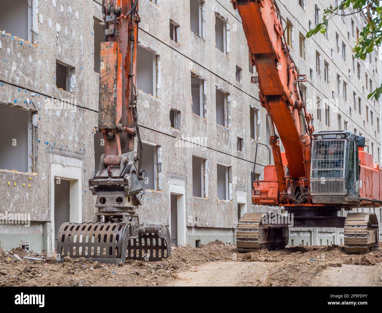 heavy Demolition excavator construction site Stock Photo - Alamy