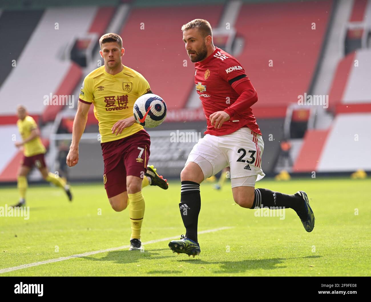 Burnley's Johann Berg Gudmundsson (left) and Manchester United's Luke ...
