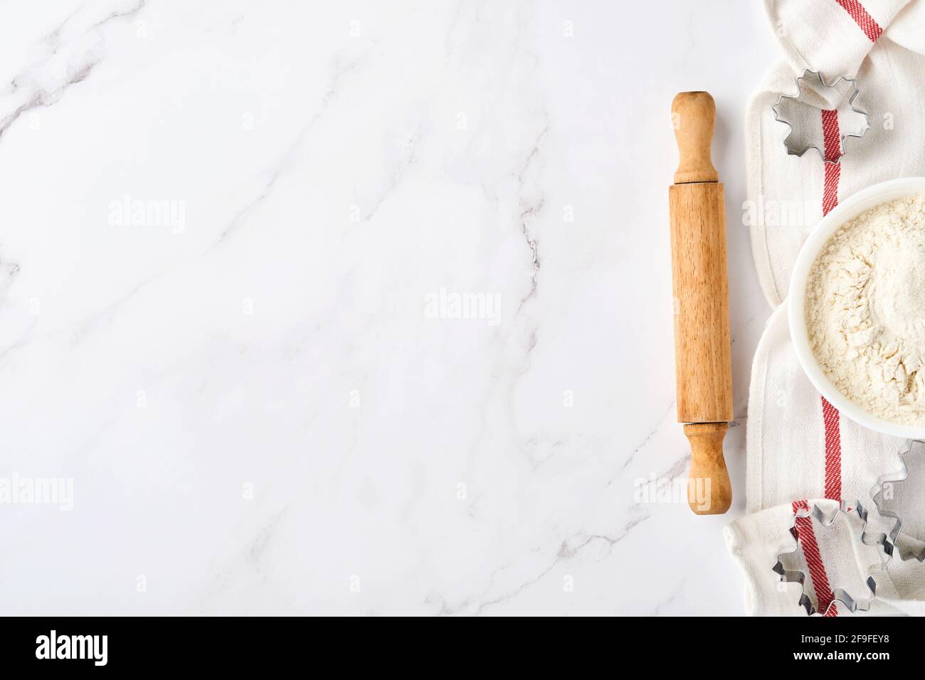 Baking background with flour, eggs, kitchen tools, utensils and cookie ...
