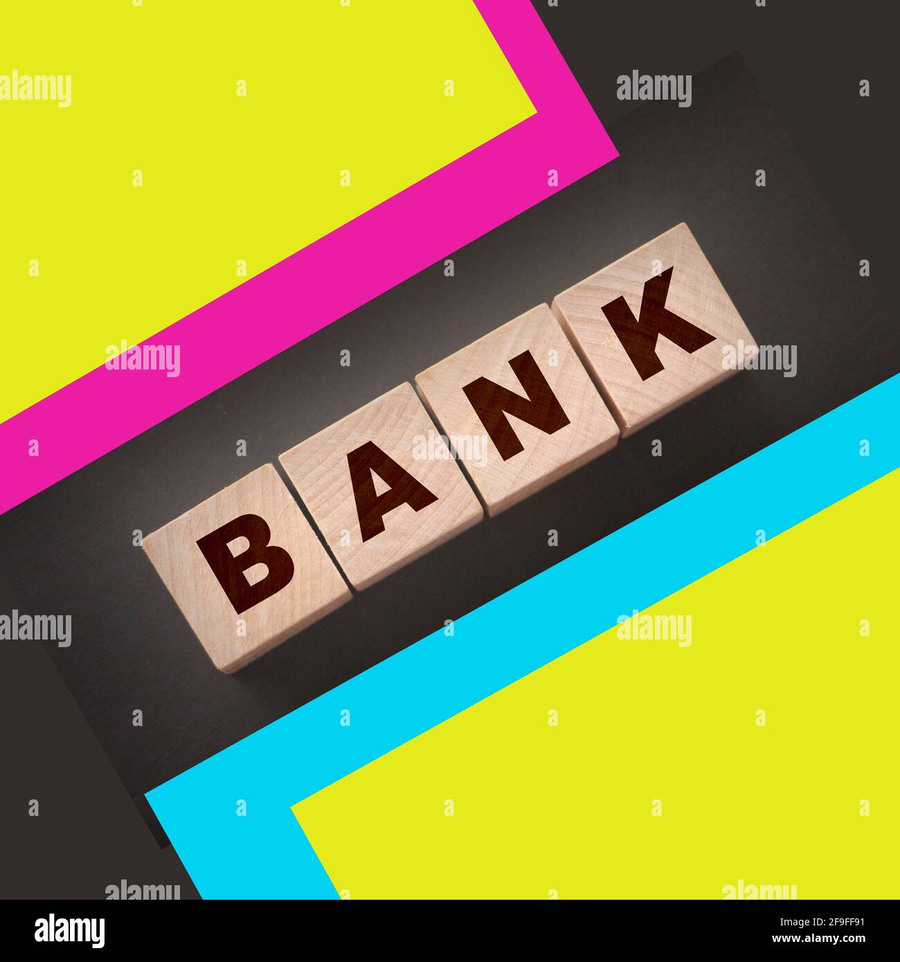 Bank word concept written on wooden cubes on black table. Banking ...