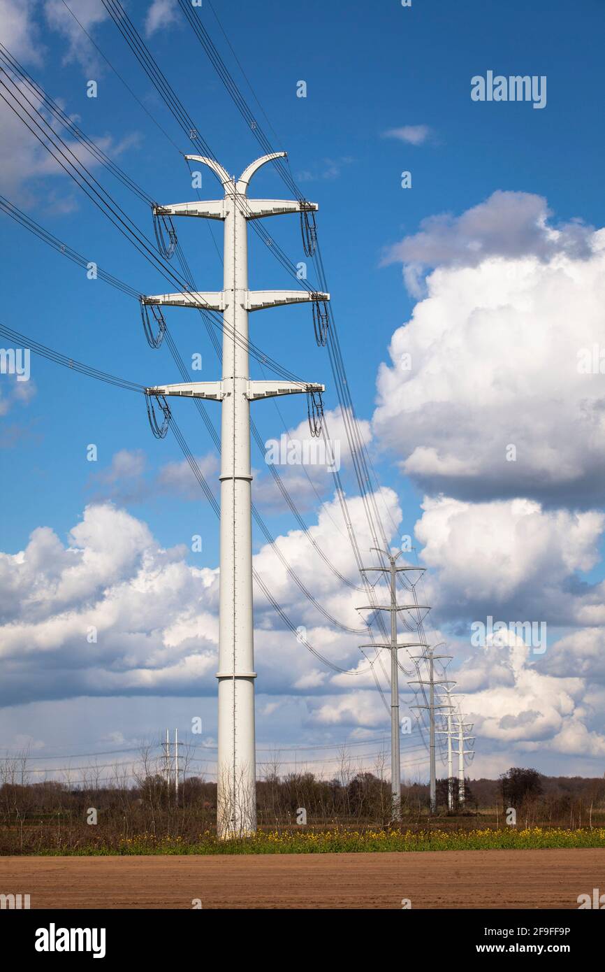 near Isselburg in Muensterland, 380 kV power lines run over solid wall ...
