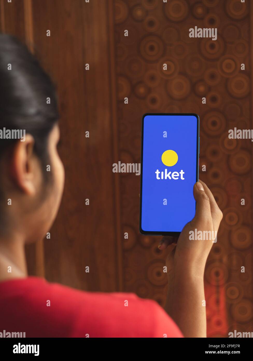 Assam, india - April 19, 2021 : Tiket logo on phone screen stock image ...