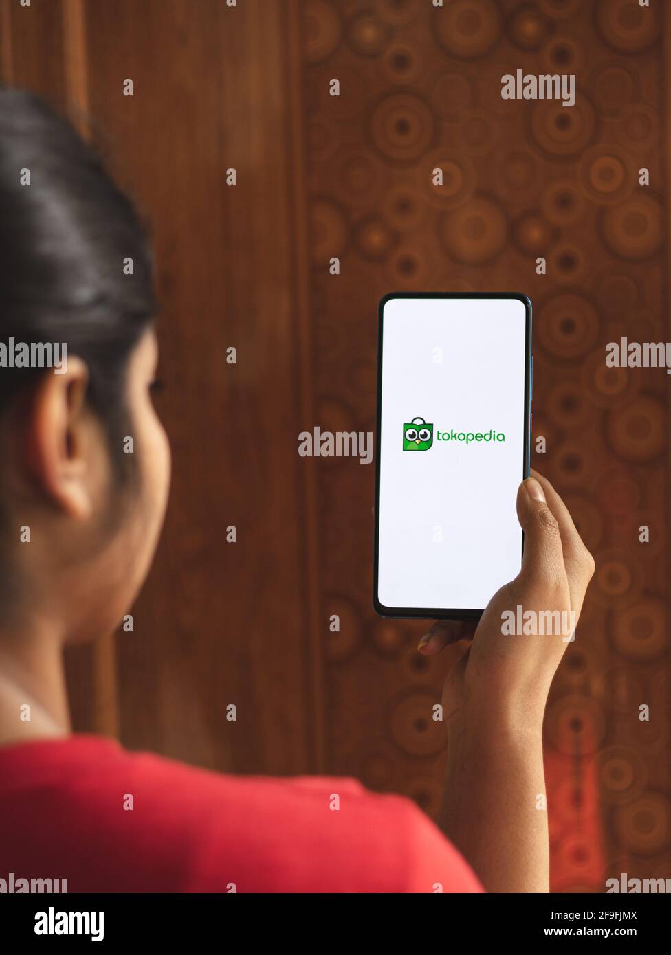 Assam, india - April 19, 2021 : Tokopedia logo on phone screen stock ...