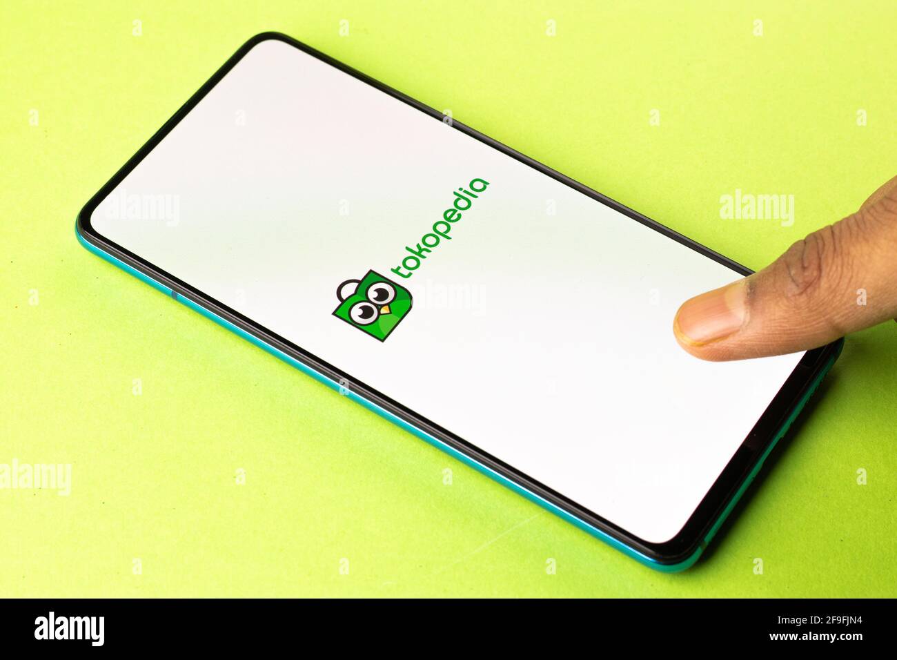 Assam, india - April 19, 2021 : Tokopedia logo on phone screen stock ...