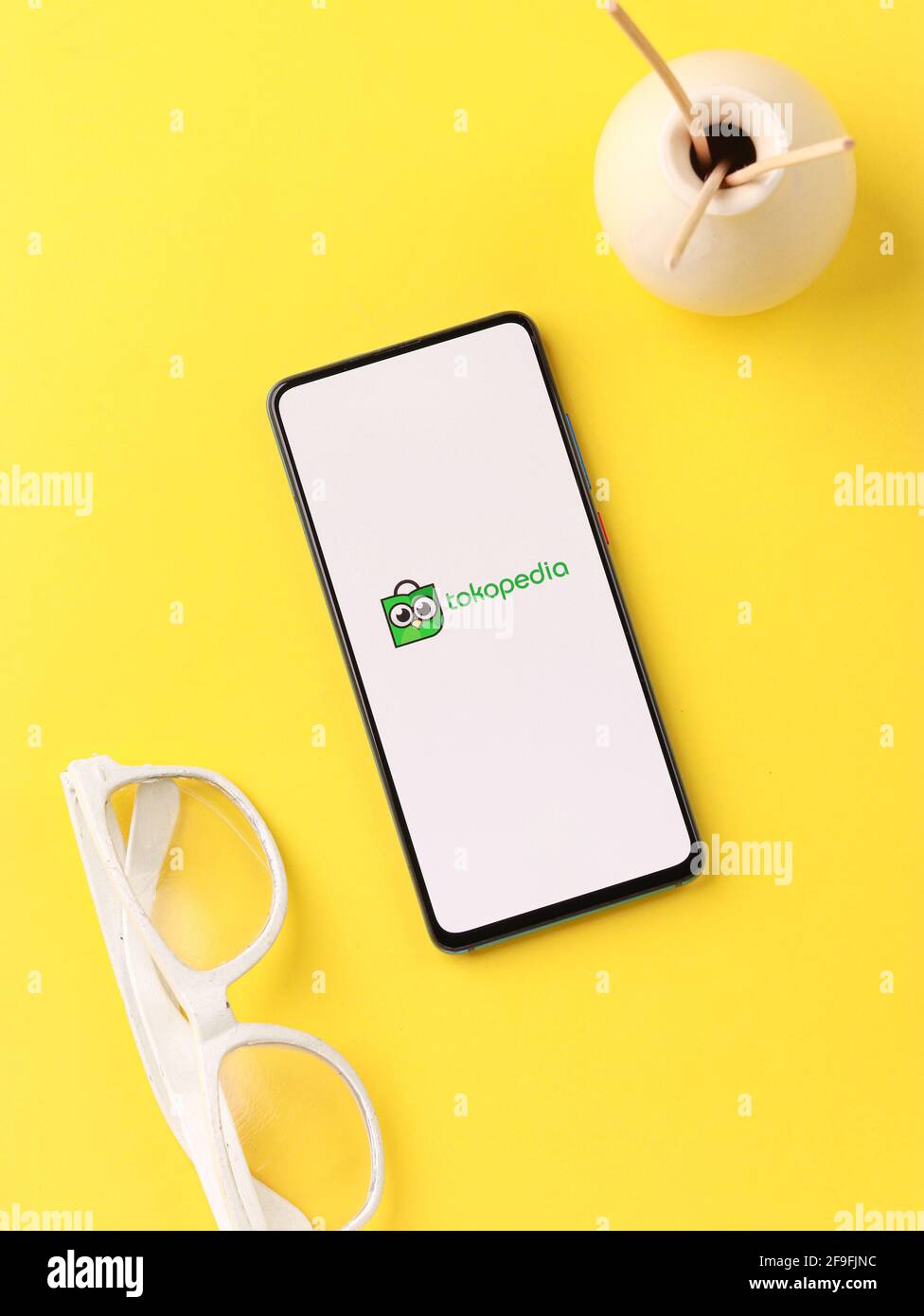 Assam, india - April 19, 2021 : Tokopedia logo on phone screen stock ...