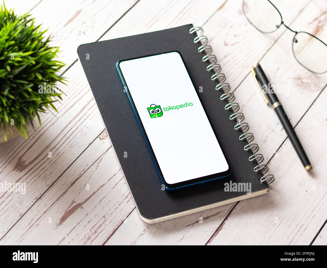Assam, india - April 19, 2021 : Tokopedia logo on phone screen stock ...