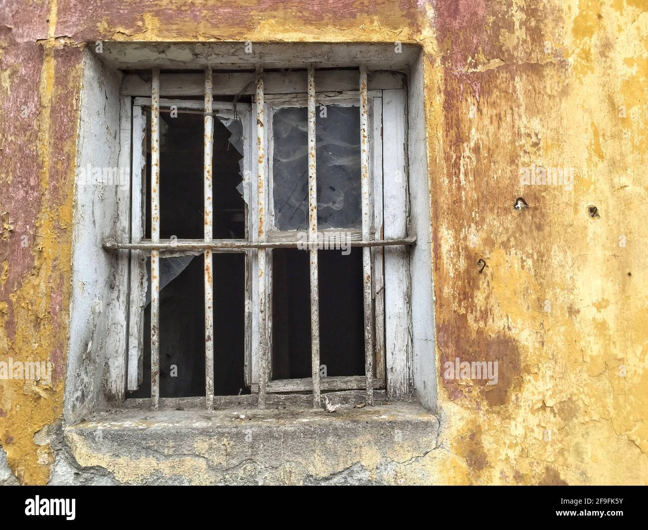 broken window of an abandoned building with copy space Stock Photo - Alamy