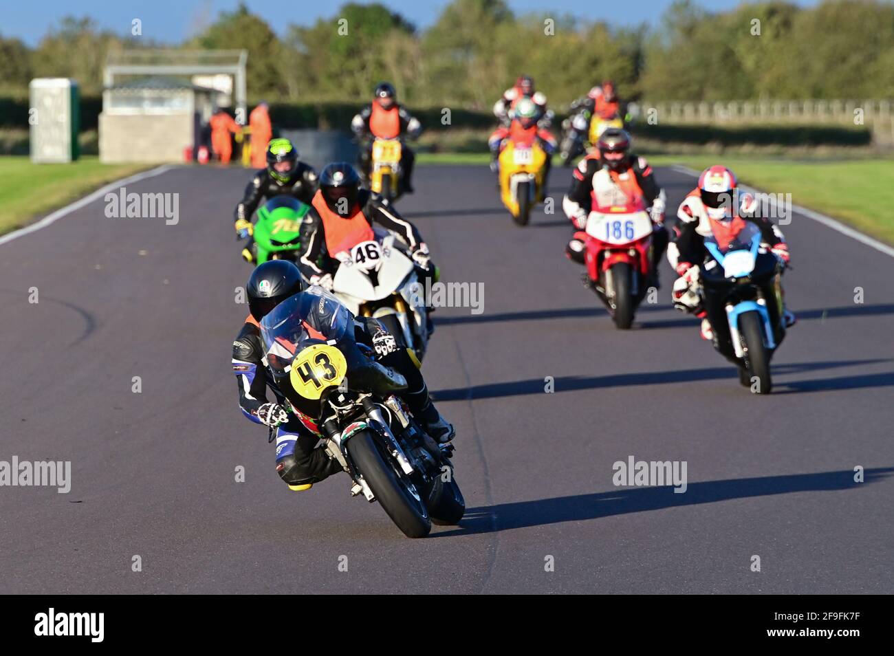 Motorbikes racing at Castle Combe Circuit as part of the NG Road Racing ...