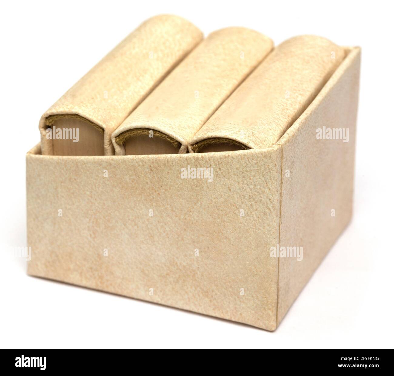 Three books over white background Stock Photo - Alamy
