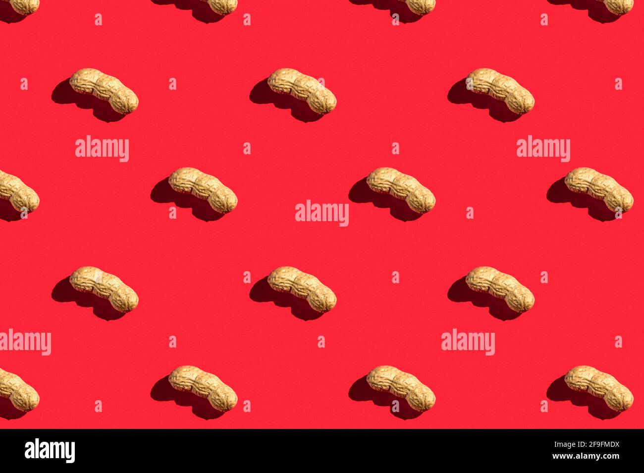 Pattern of peanuts with shell. Fashionable sunny pattern of peanuts ...