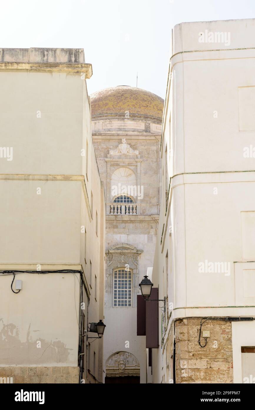 The ancient buildings and narrow path of the city of Cadiz, southern ...