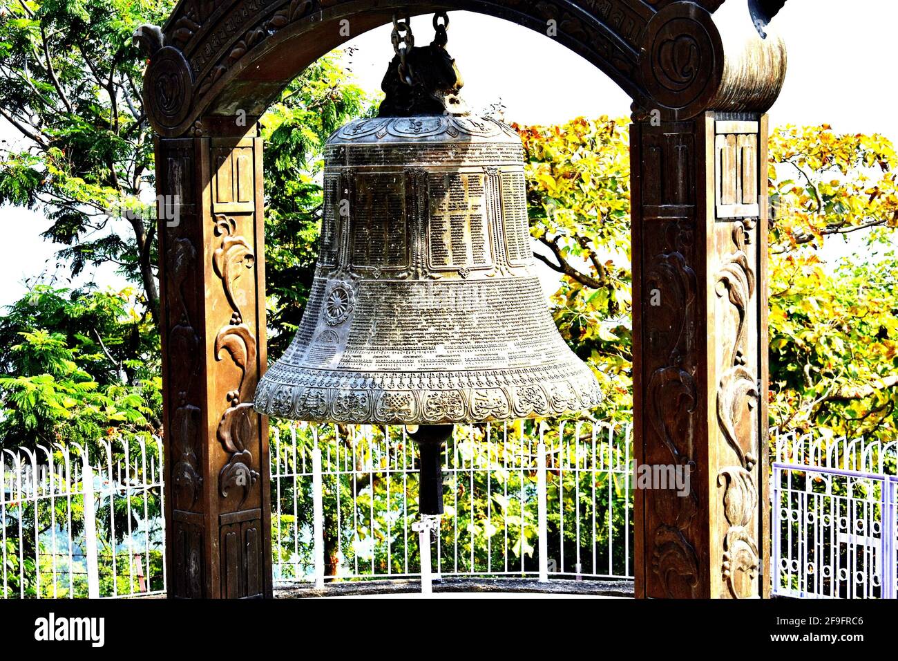 A closeup of an ancient huge church bell with inscriptions Stock Photo ...