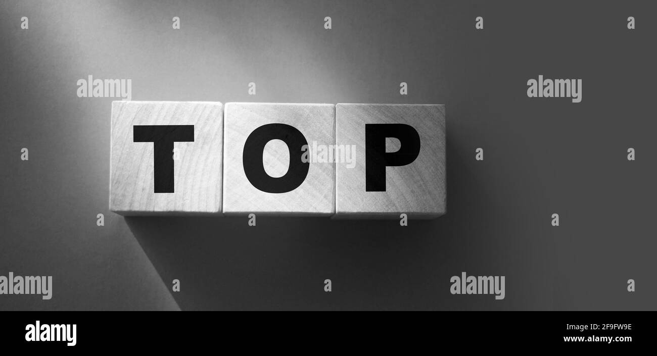TOP Word Written In Wooden Cube. TOP text concept. cube wooden block.s ...