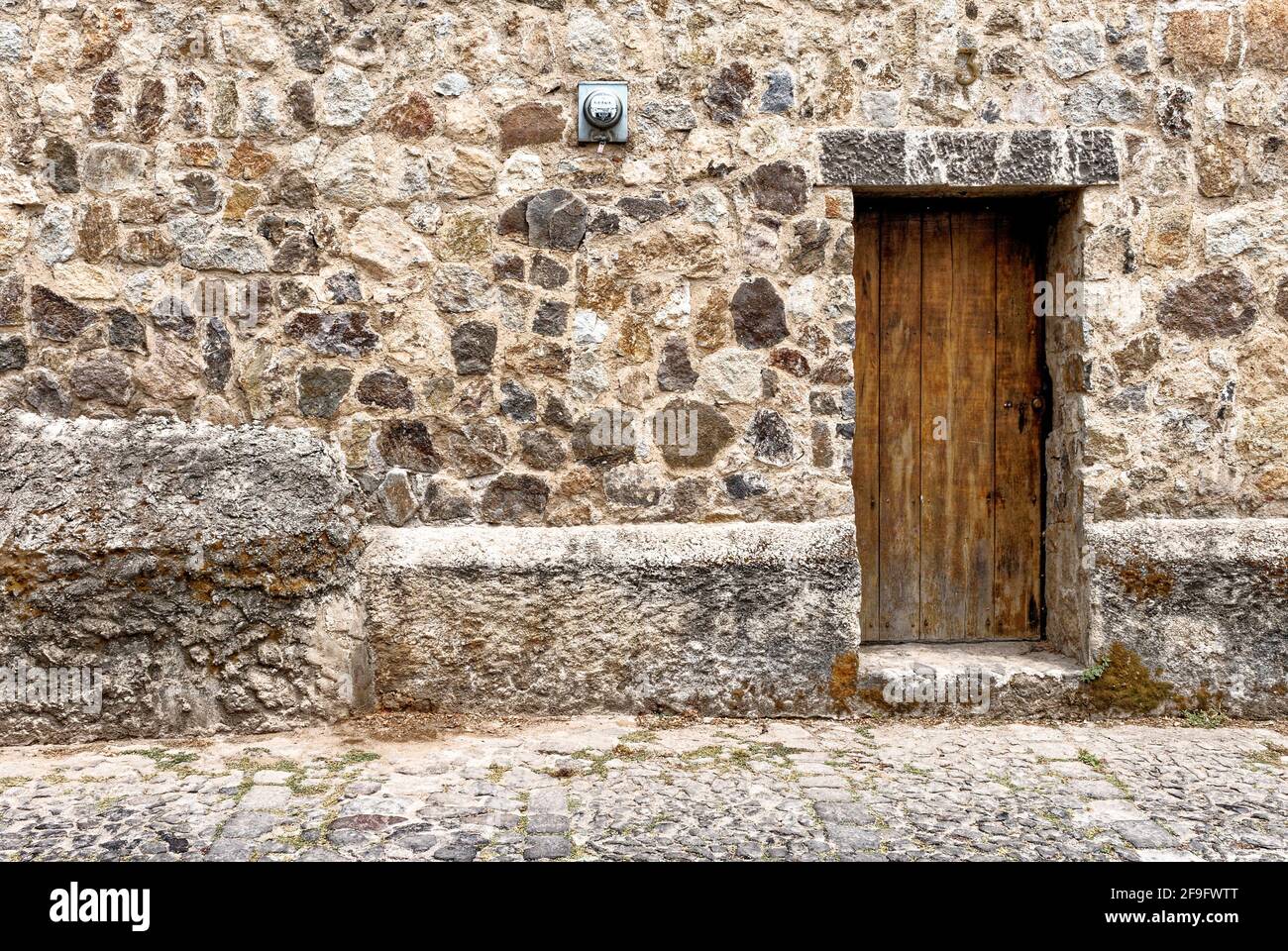 Spanish Colonial Style - Wooden Door And Stone Wall In Antigua ...