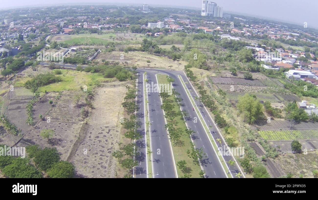 An aerial view of highway roads leading to a city Stock Photo - Alamy