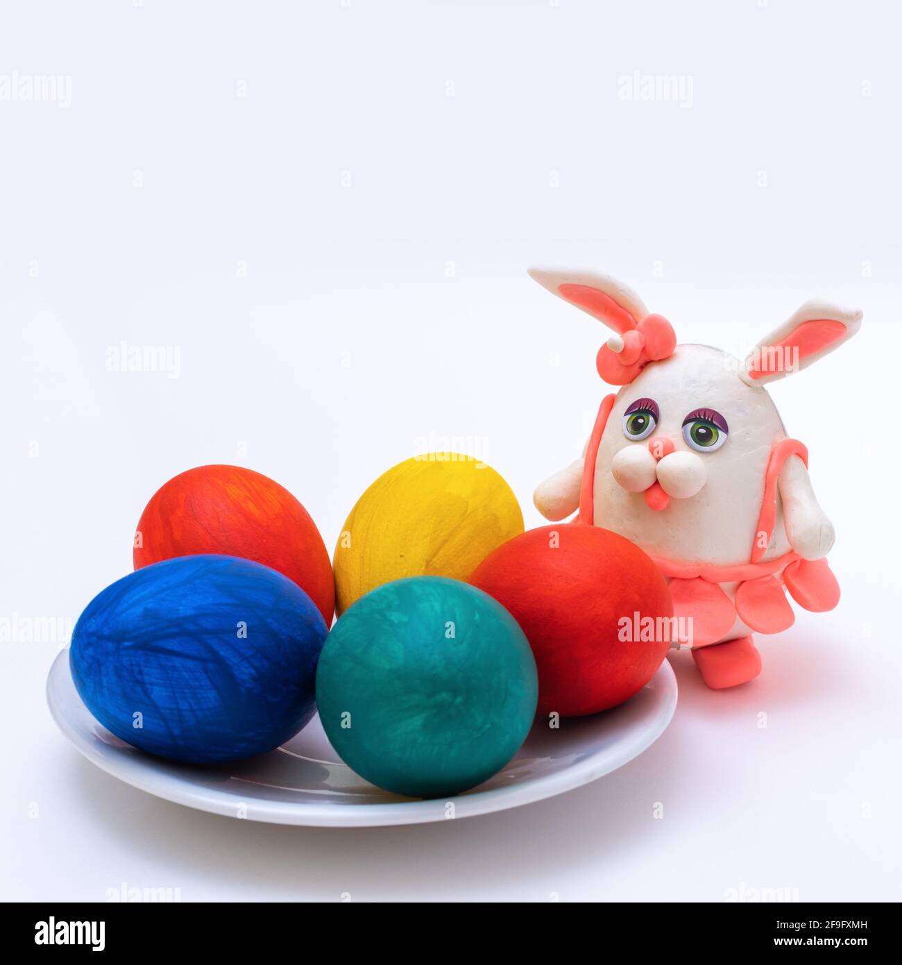 Happy Easter concept. Hand-painted Easter eggs and a hand-made ...