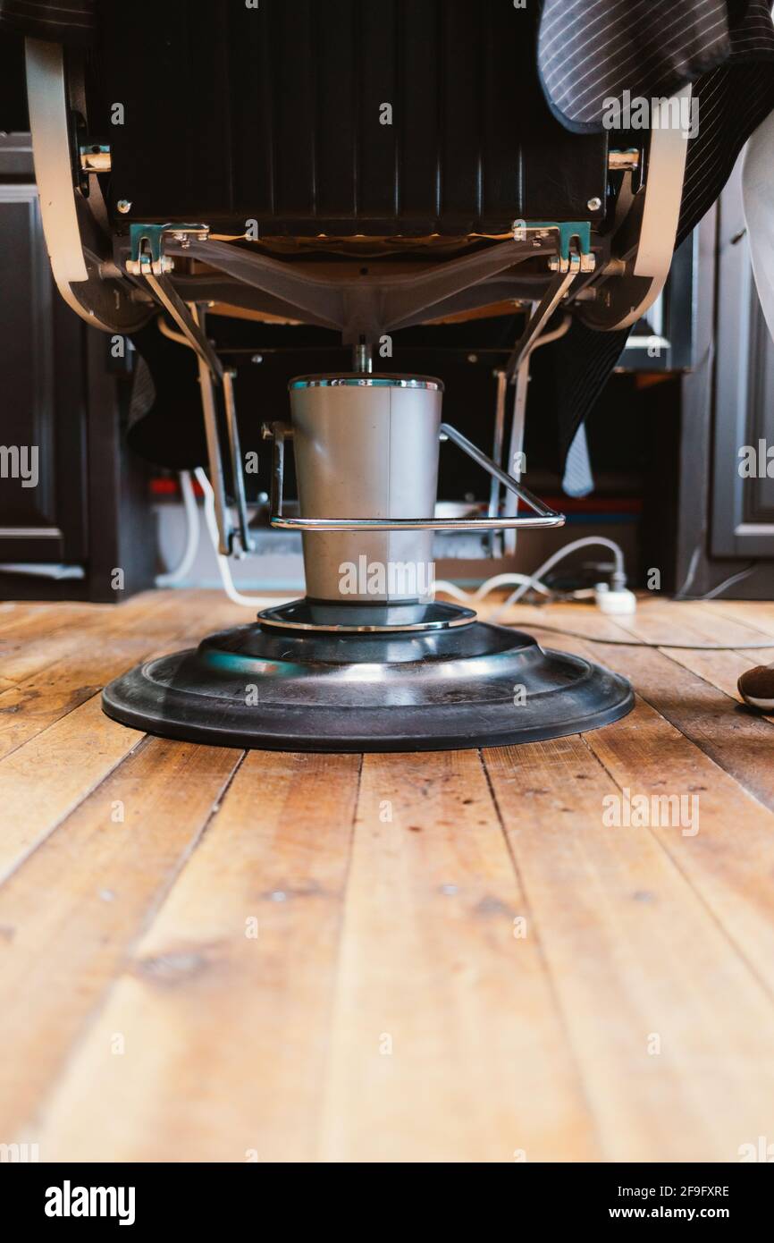 Barbershop chair, close-up rear view mechanism of professional ...