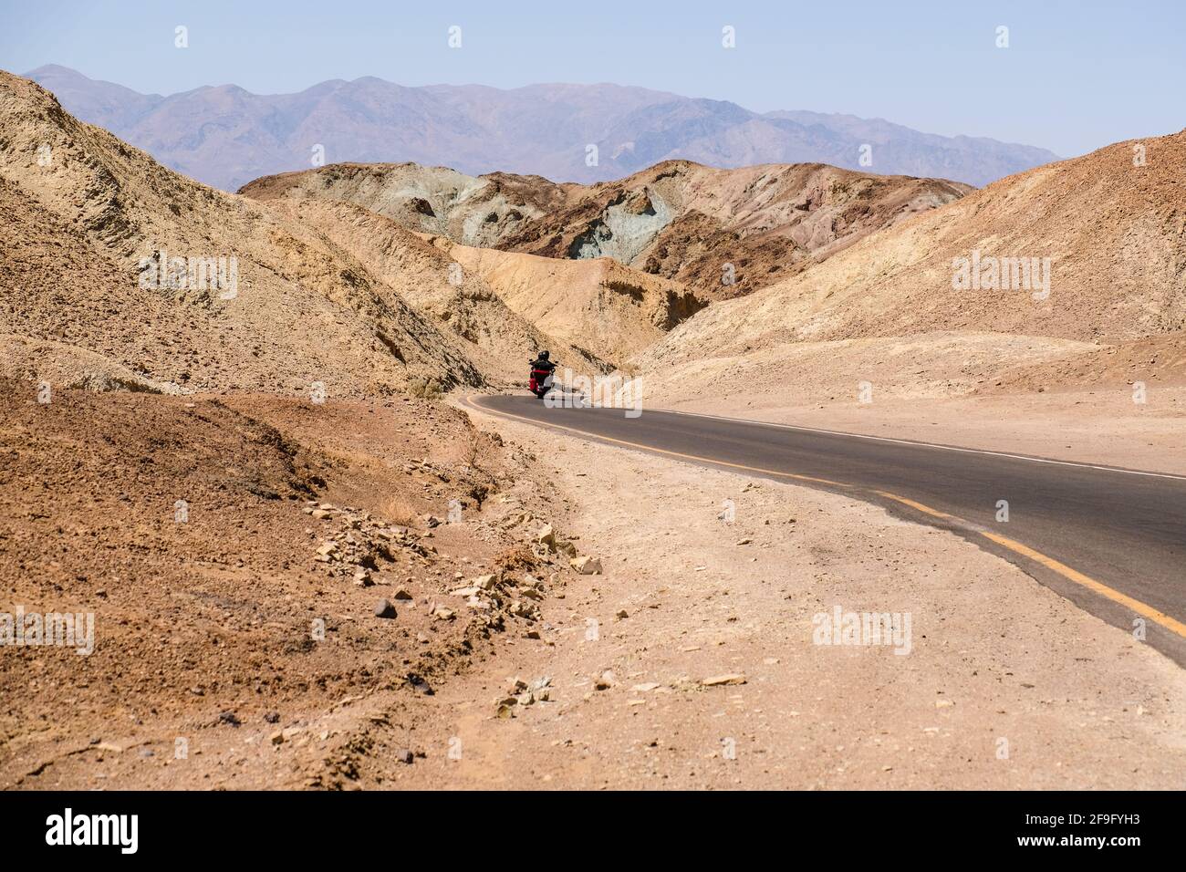 Motor Cyclists Turning Corner On Curving Road at Artists Scenic Loop ...