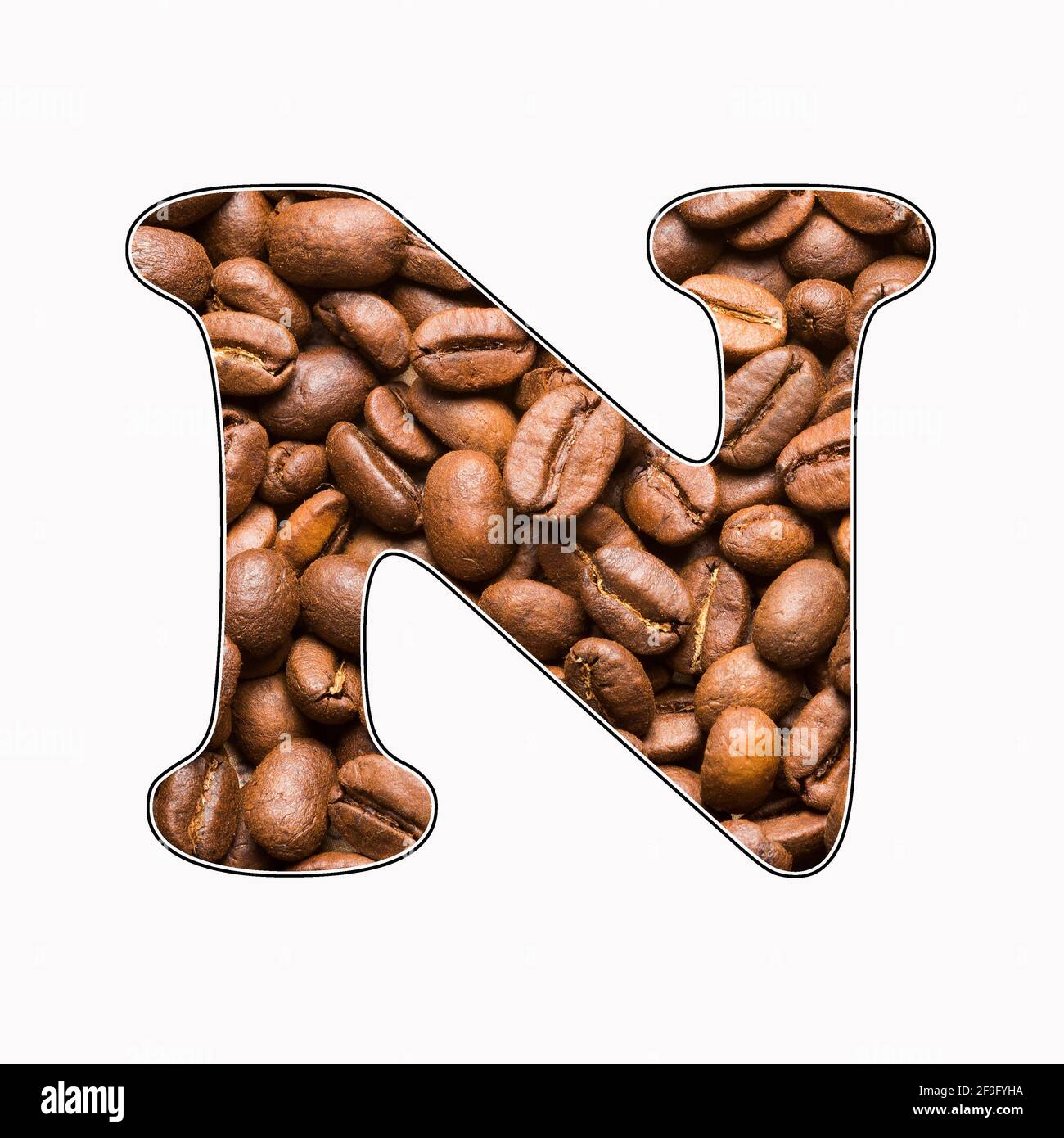 N, letter of the alphabet - coffee beans background. Coffea Stock Photo ...