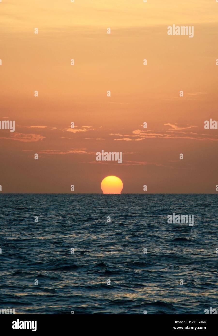 Tropical sunset over the Great Barrier Reef, Australia Stock Photo - Alamy