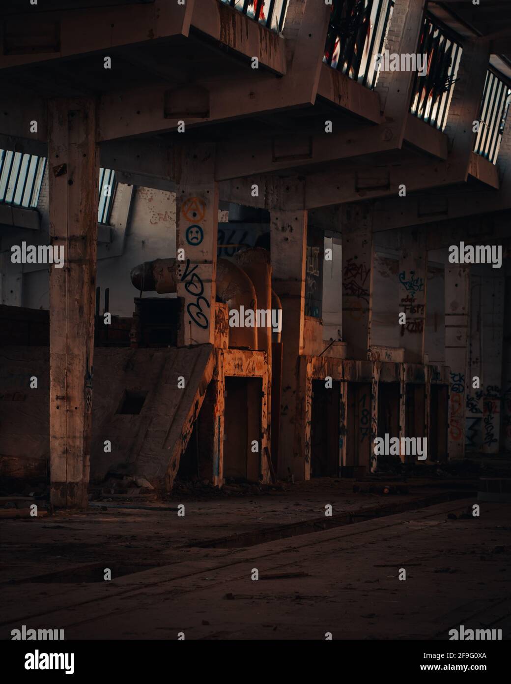 A vertical shot of an old factory at golden hour Stock Photo - Alamy