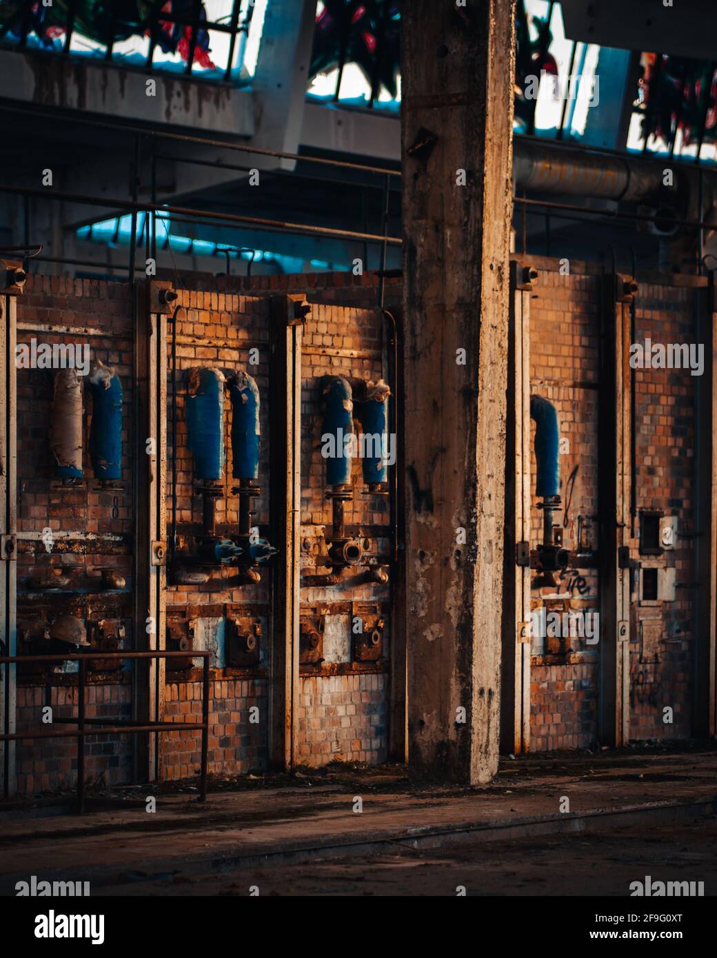 A vertical shot of an old factory at golden hour Stock Photo - Alamy