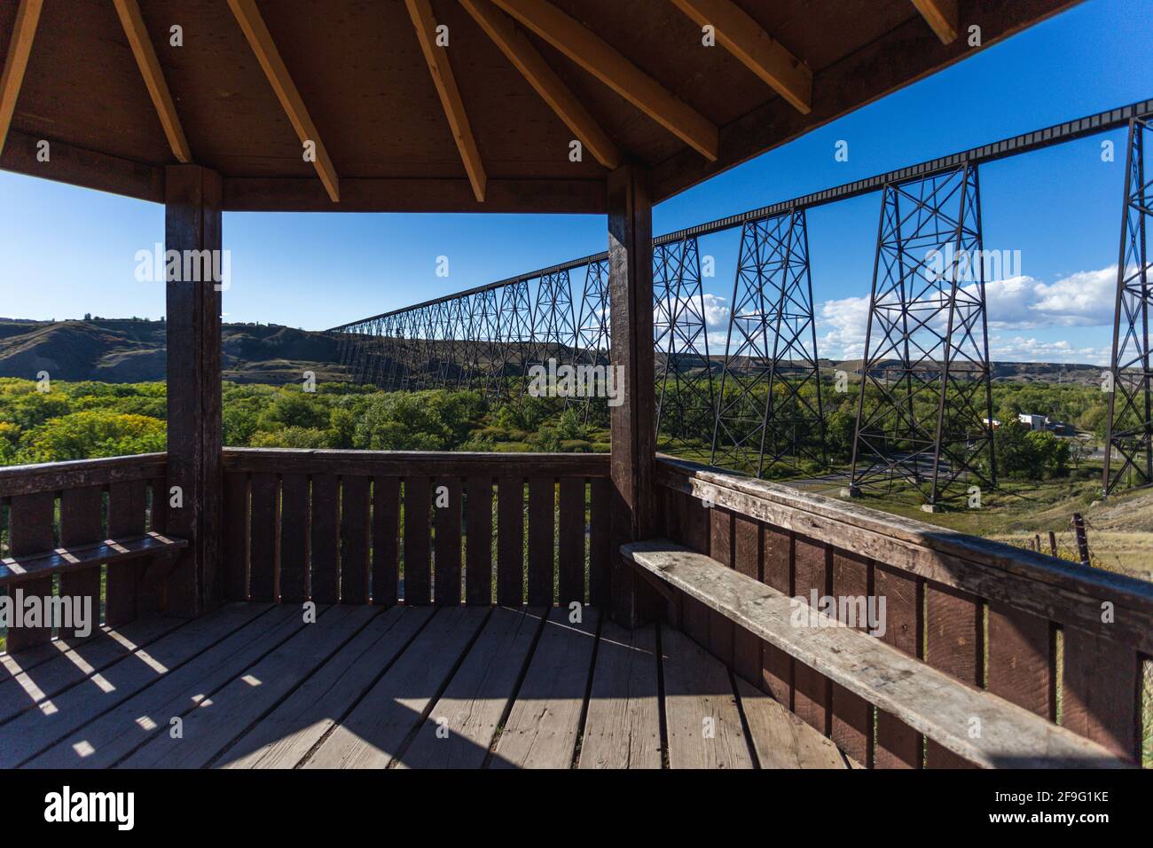 view of a super tall and long steel bridge in summer with blue sky from ...