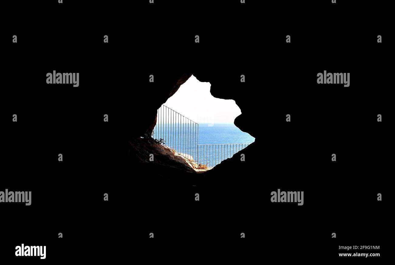 A photo inside Ghar Hasan cave, a coastal cliff cave in the Maltese ...