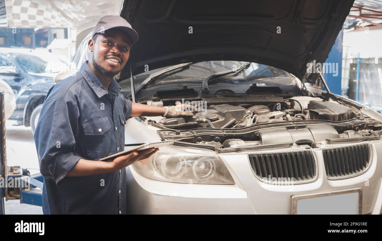 African Man Repairing Car Engine High Resolution Stock Photography and ...