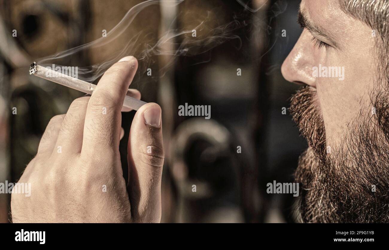 Smoldering cigarette hi-res stock photography and images - Alamy