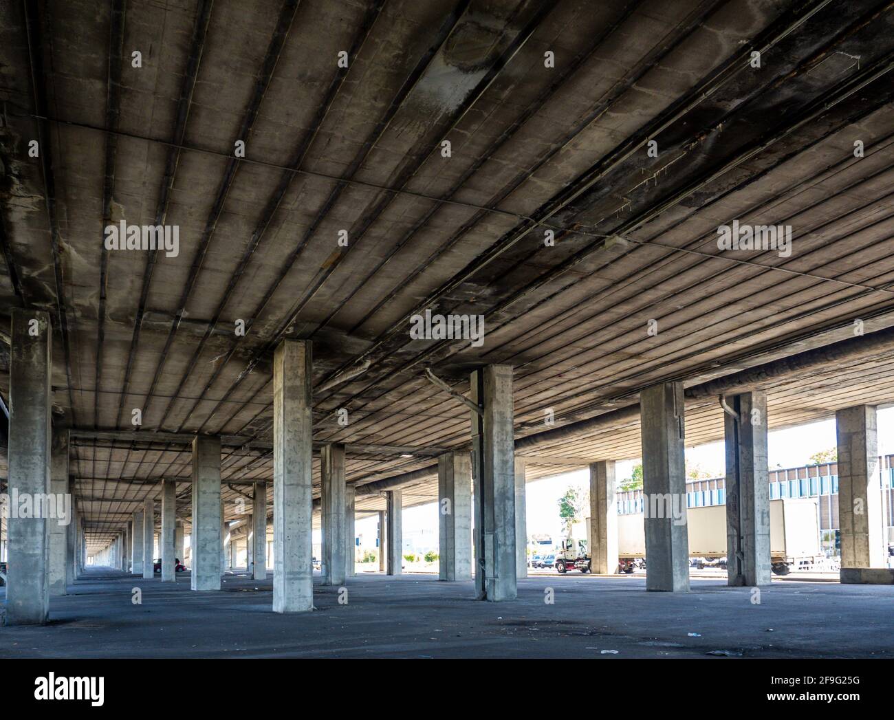 wide view of under a concrete bridge Stock Photo - Alamy