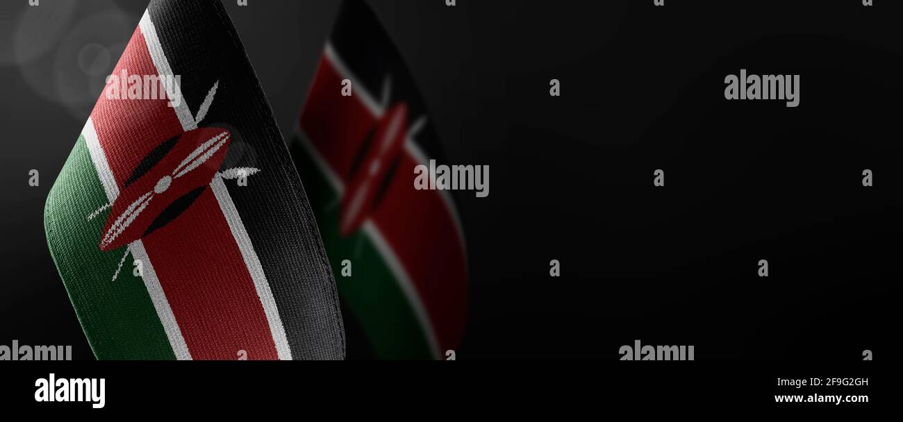 Small national flags of the Kenya on a dark background Stock Photo - Alamy